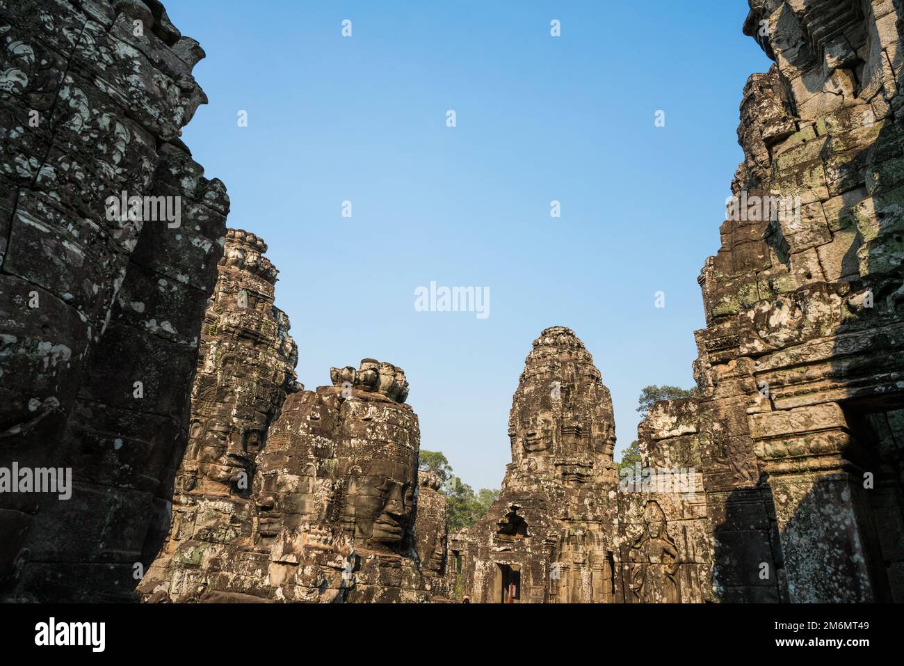 Angkor bayon giant statues Stock Photo - Alamy