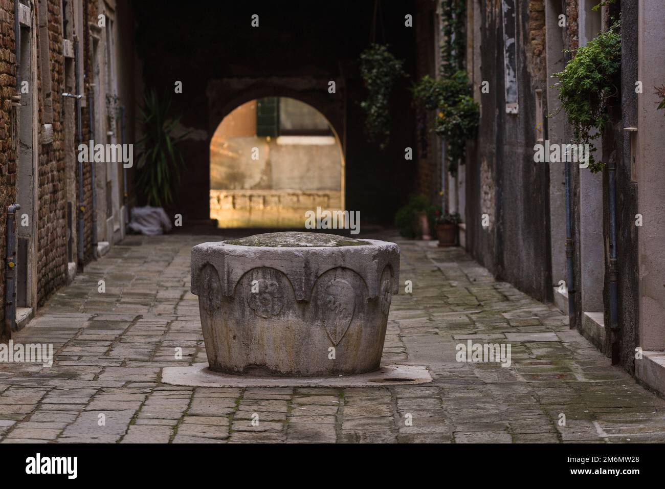 Old water well in Venice, Italy Stock Photo - Alamy