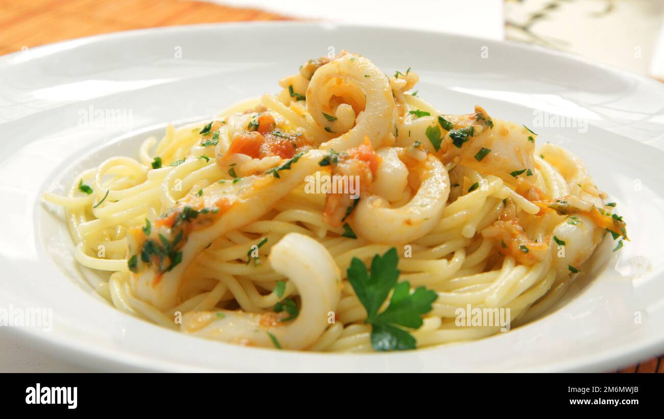 Pasta frutti di mare. Fresh pasta with seafood and vegetables Stock ...