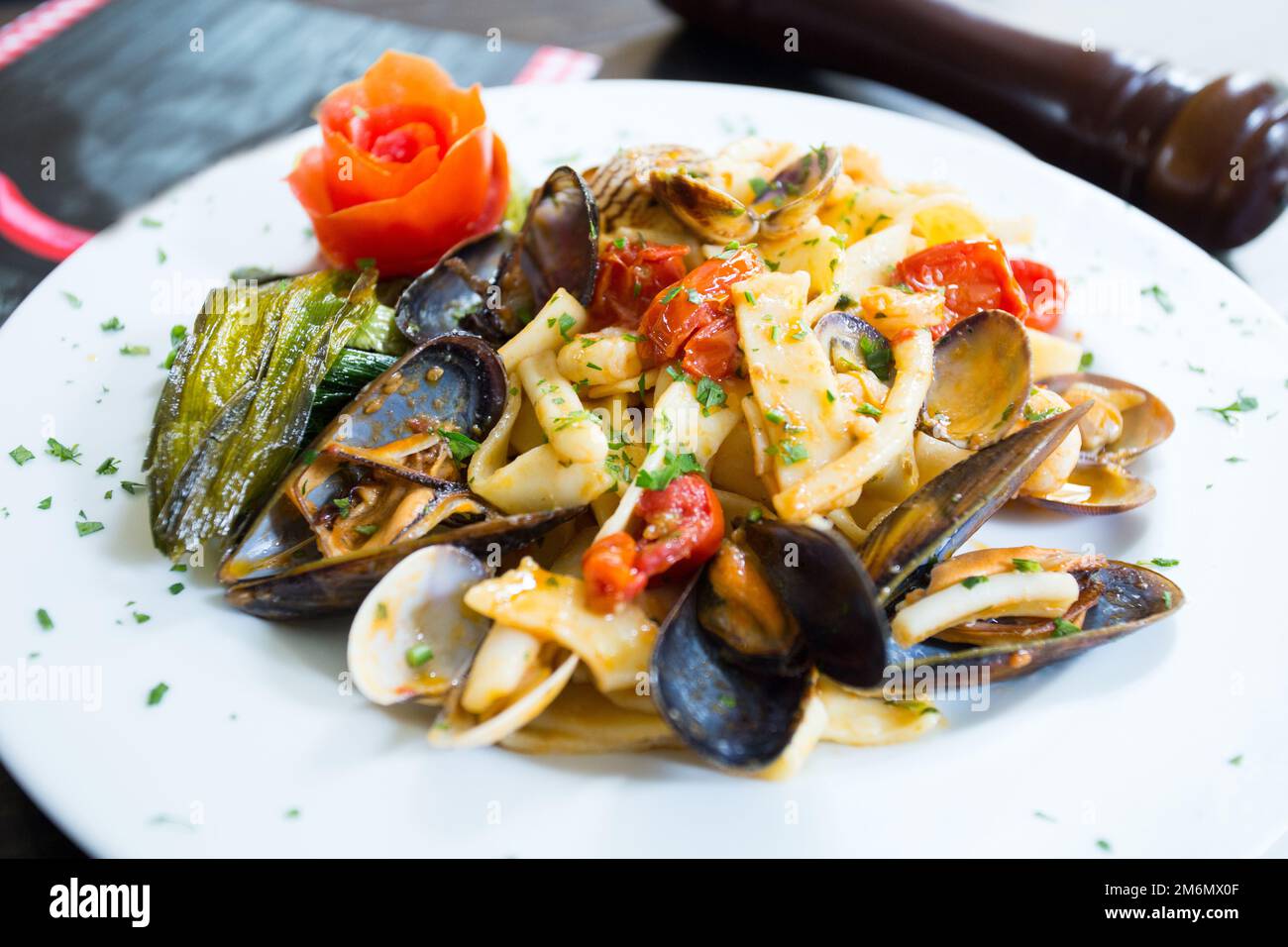 Pasta frutti di mare. Fresh pasta with seafood and vegetables Stock ...