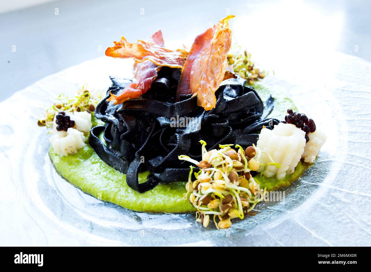 Pasta frutti di mare nero di sepia. Fresh pasta with seafood and ...