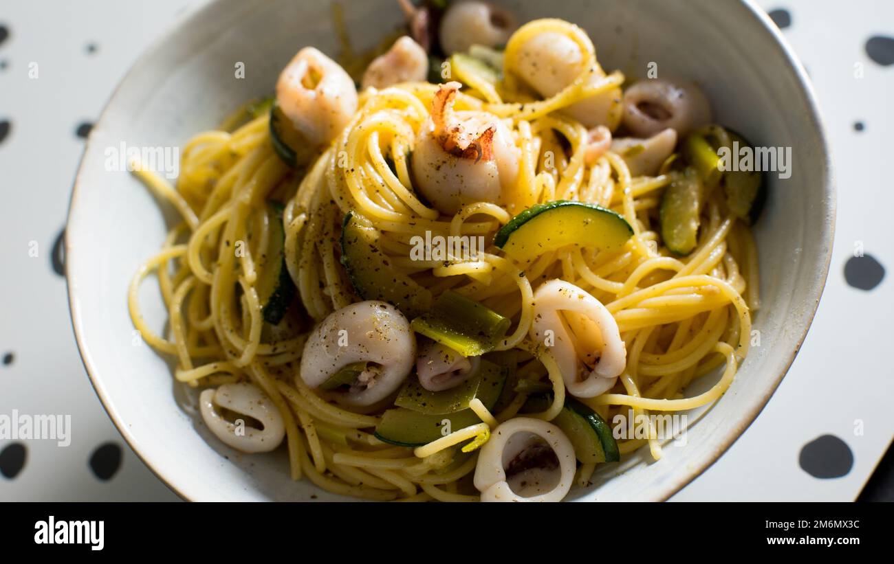 Spaghetti with calamari Pasta frutti di mare. Fresh pasta with seafood ...