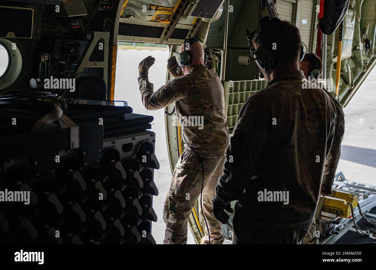Aerial gunners with the 73rd Special Operations Squadron prepare to ...