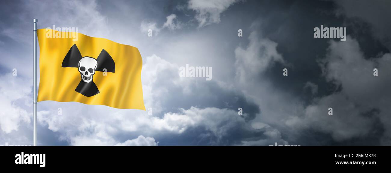Radioactive nuclear symbol death flag on a cloudy sky Stock Photo - Alamy