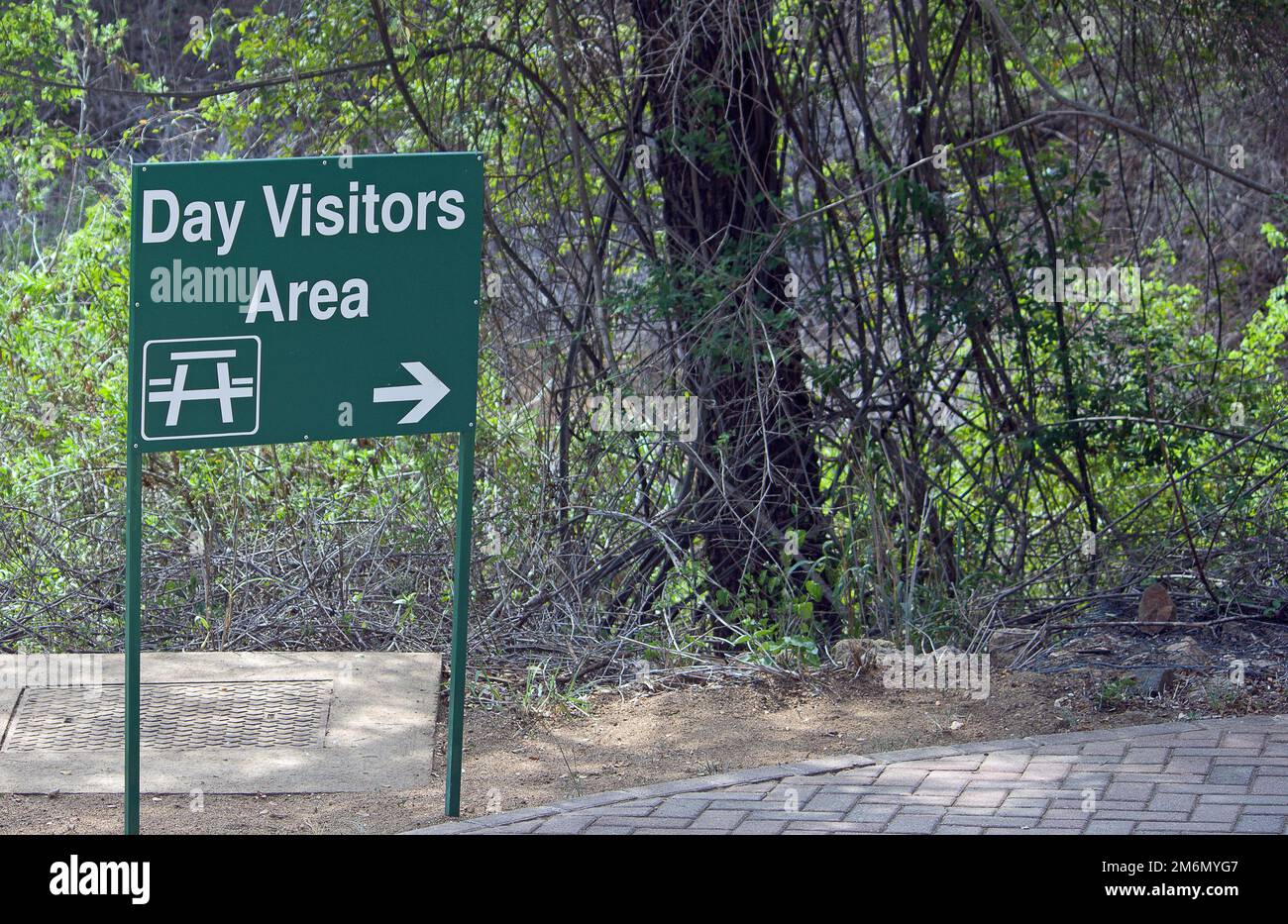Green and white information sign showing way to day visitors area Stock ...