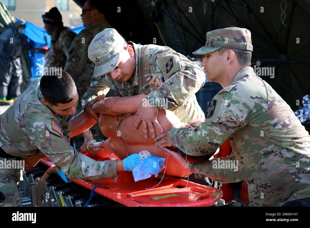 Sgt. Kristopher Franco, Pfc. Antonio Naranjo and Pvt. Raul Rodriguez from the 491st Medical ...