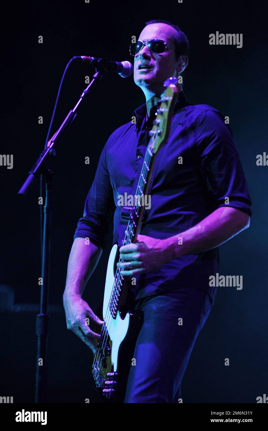 Robert DeLeo of Stone Temple Pilots with Chester Bennington performs at ...