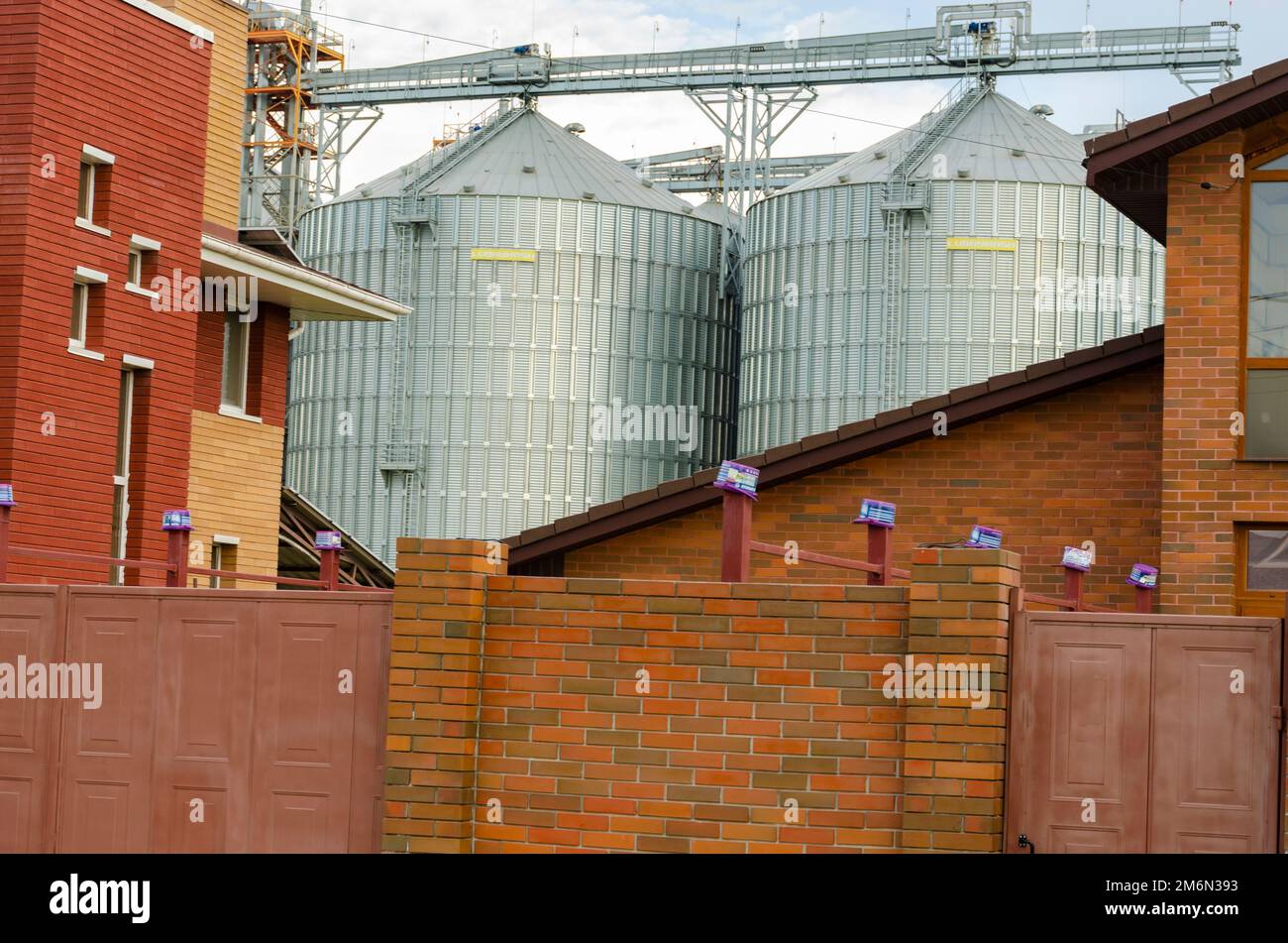Granary among the houses. Neighborhood of a grain storage with a ...
