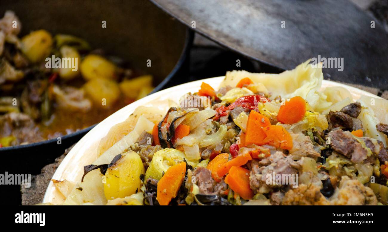 Dimlama on a platter. Uzbek cuisine. Vegetables cooked in their own ...