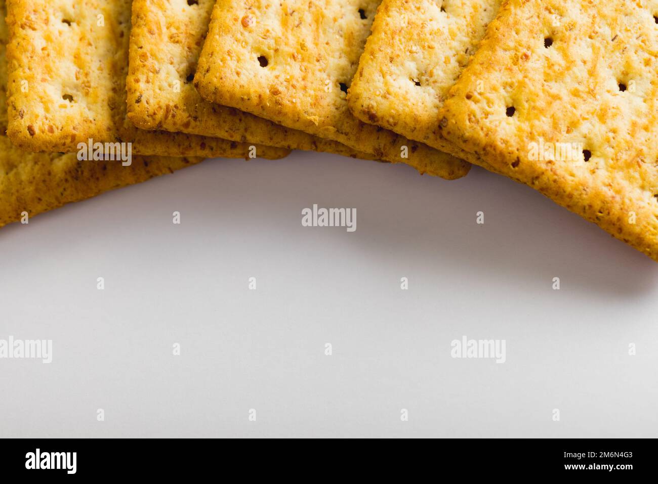 Close-up of crackers arranged on white background with copy space Stock ...