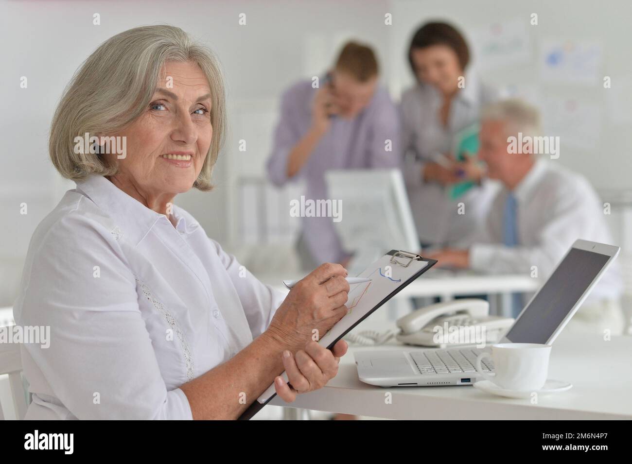 different generations work in the family business Stock Photo - Alamy