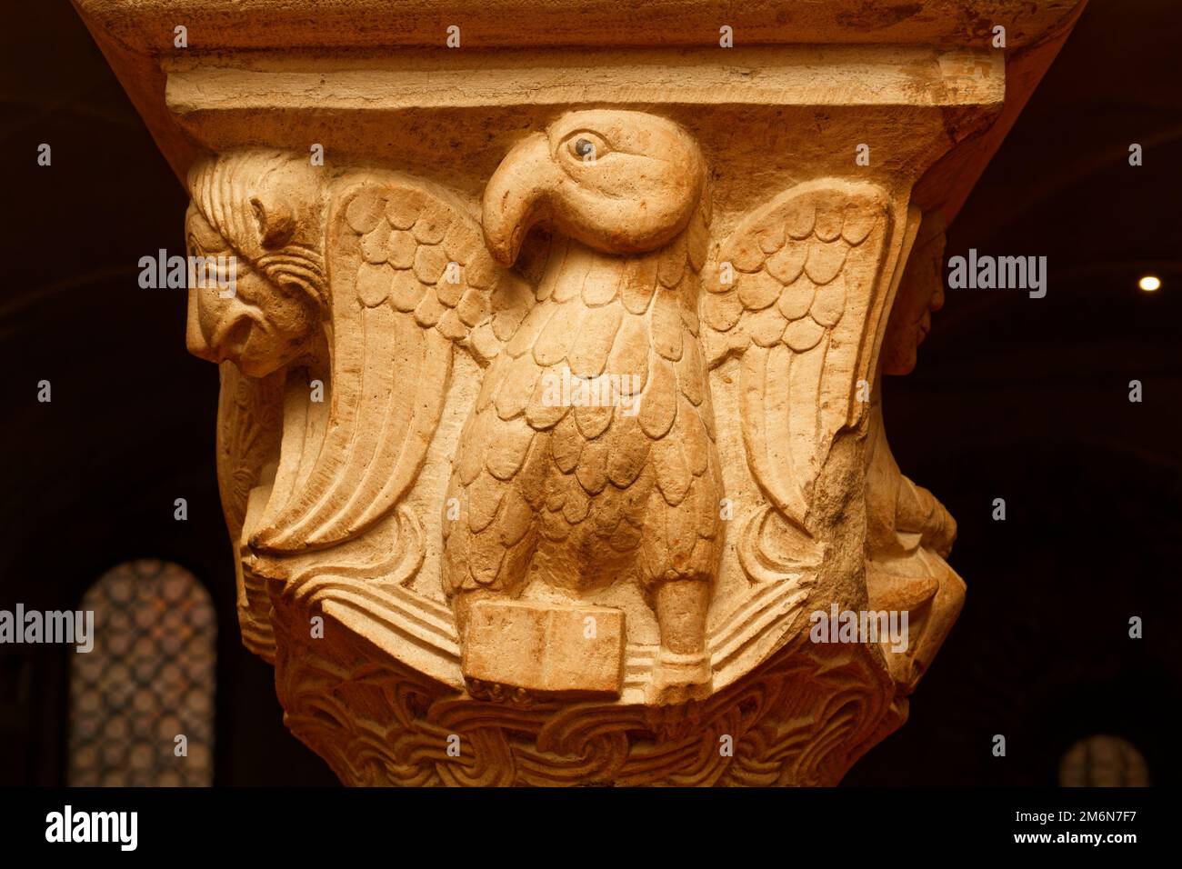 Winged eagle, symbol of Saint John, detail of the capital in the crypt ...