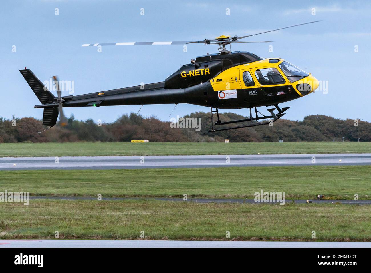 A Eurocopter AS355 F1 G-NETR PDG Aviation Services helicopter landing ...