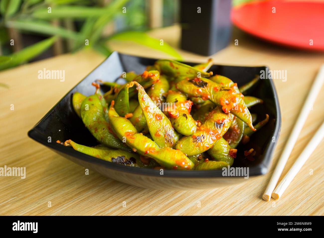 Edamame is a preparation of immature soybeans in the pod, found in ...