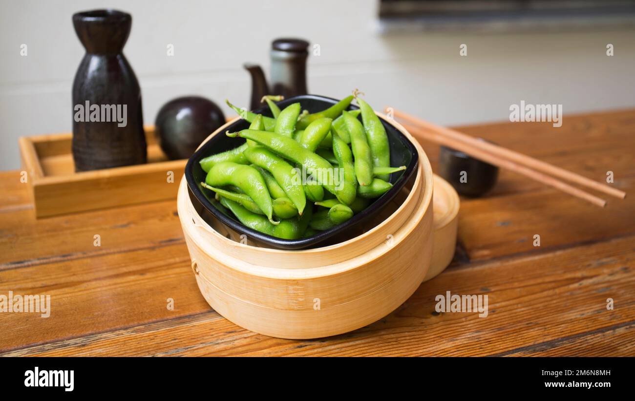 Edamame is a preparation of immature soybeans in the pod, found in ...