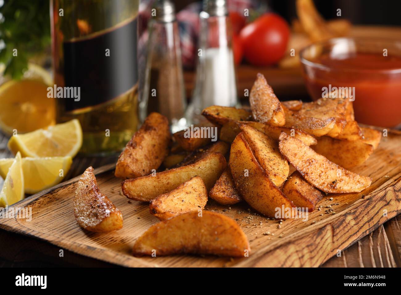 Rustic spicy fried potato slice Stock Photo - Alamy