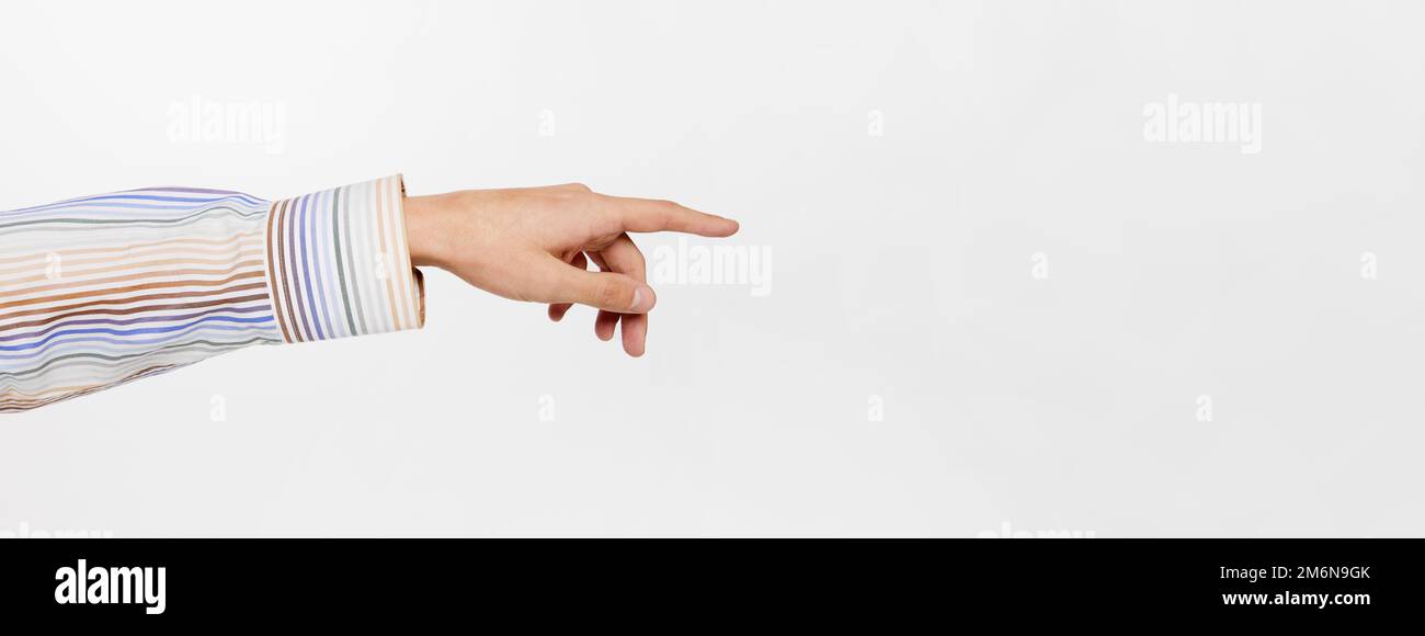 Human hand pointing at right direction isolated over white background ...