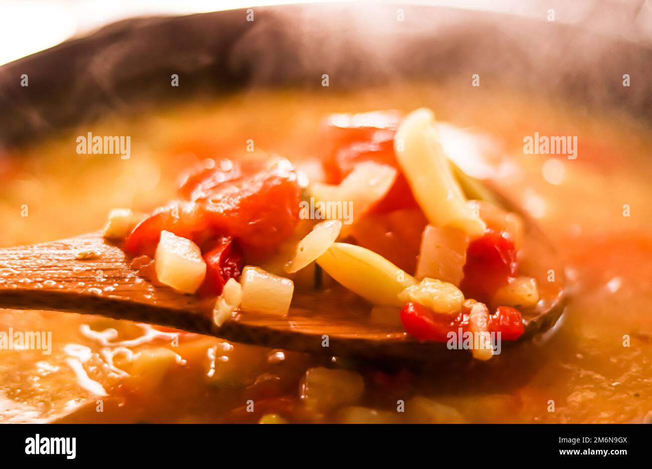 Cooking vegetable soup in saucepan, comfort food and homemade meal ...