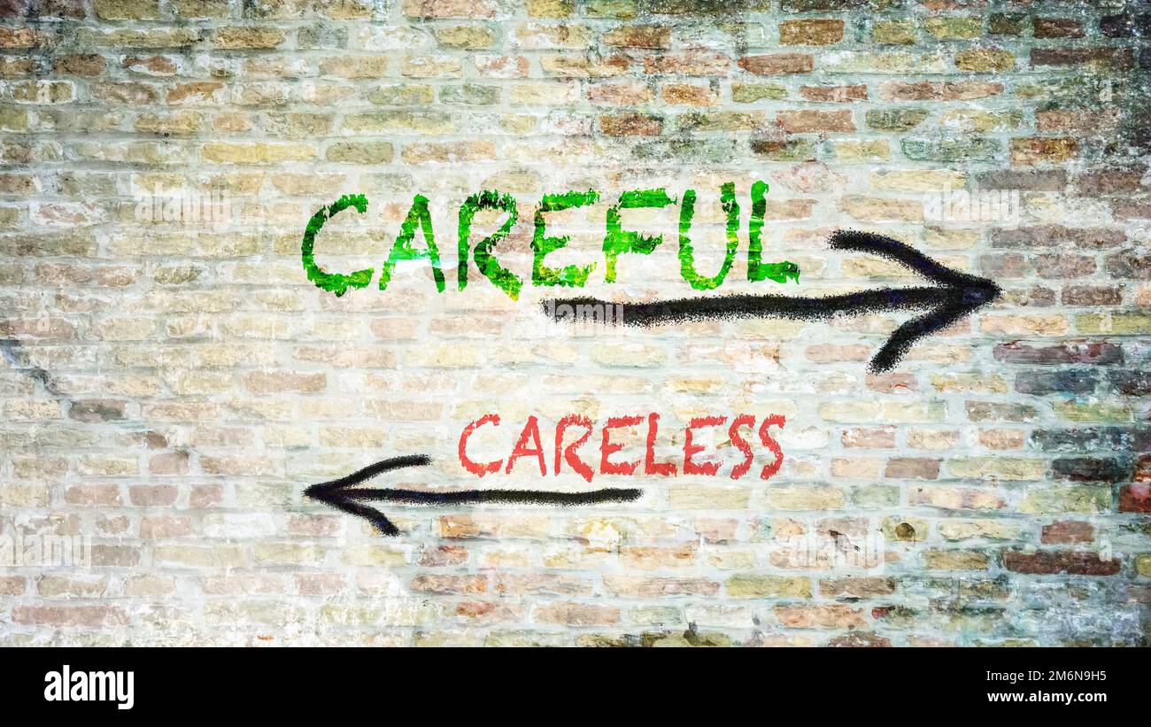 Street Sign Careful versus Careless Stock Photo - Alamy