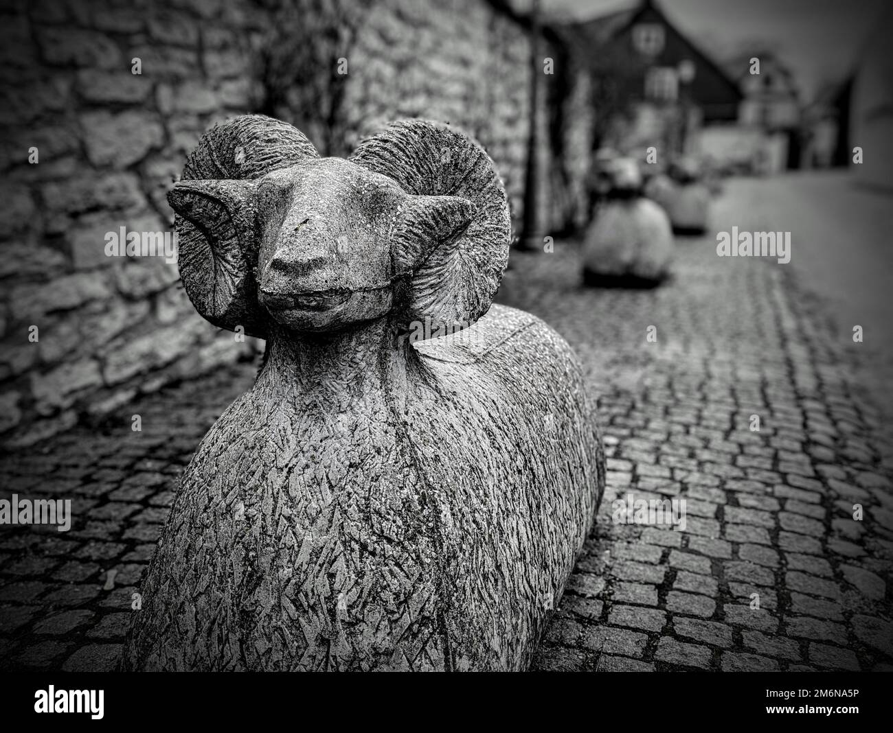 A limestone statue in the shape of a sheep in Visby, on the island of ...