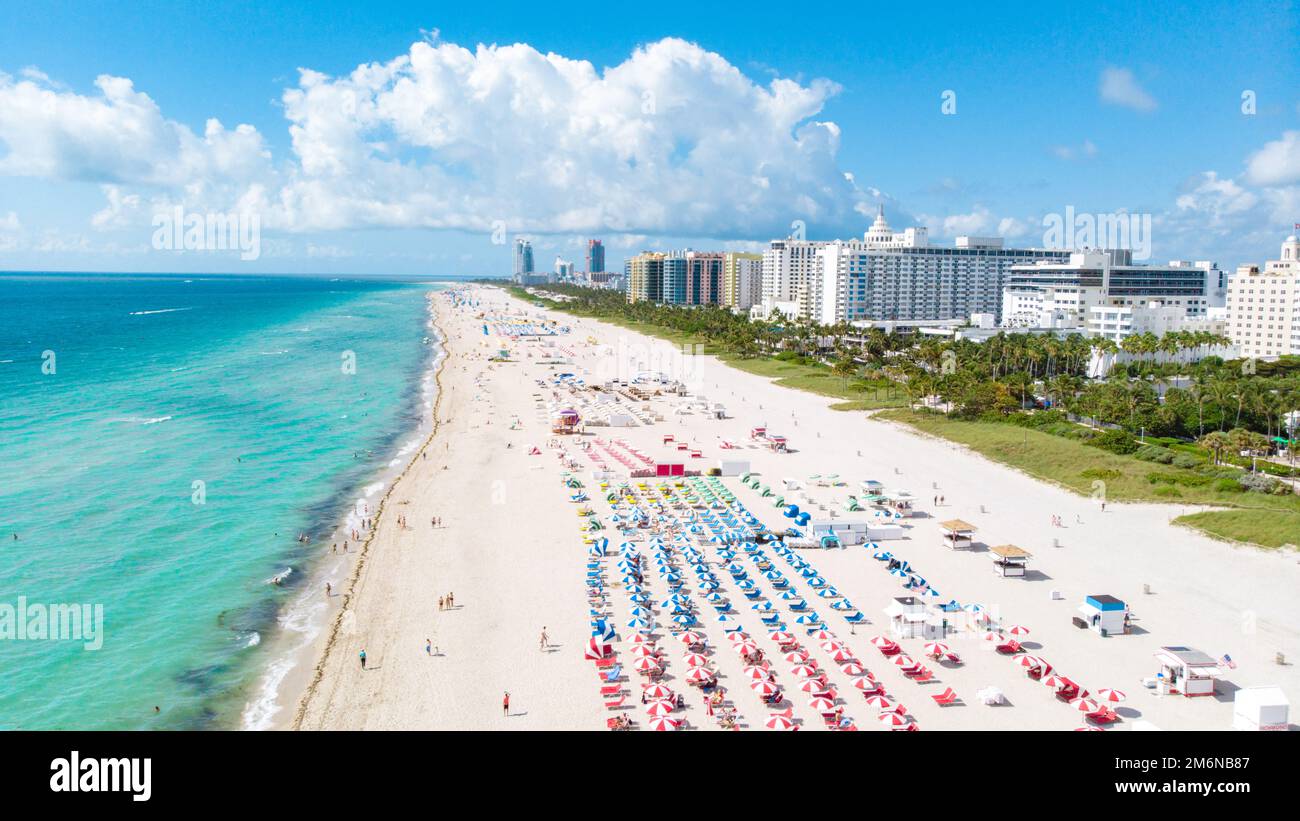 Drone aerial view at Miami South Beach Florida, Beach with colorful ...