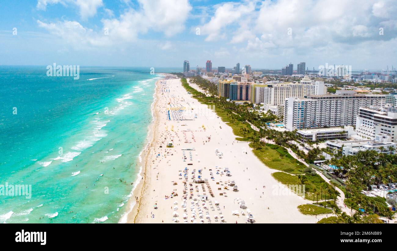 Drone aerial view at Miami South Beach Florida, Beach with colorful ...