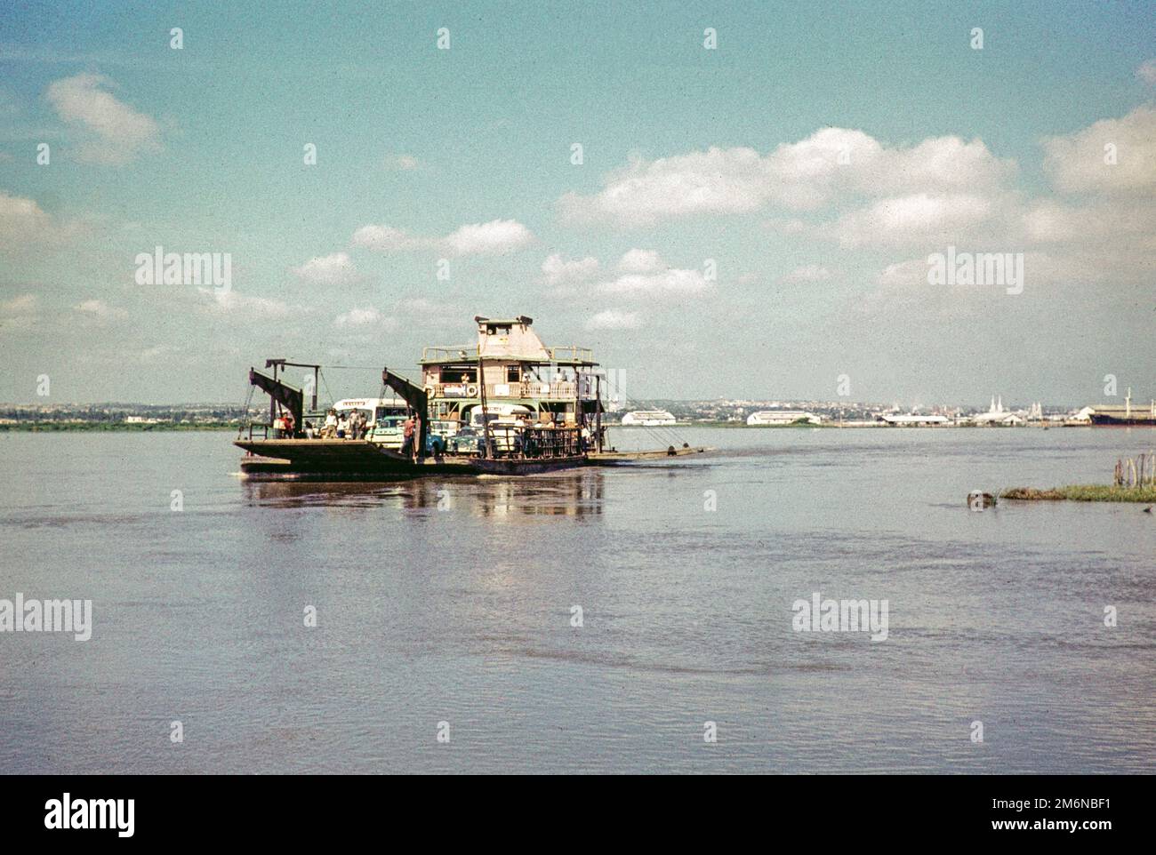 Vehicle ferry crossing Rio Magdalena river with Barranquilla in ...