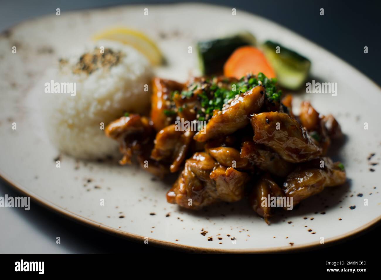 Chicken cooked in Japanese style with teriyaki sauce Stock Photo - Alamy
