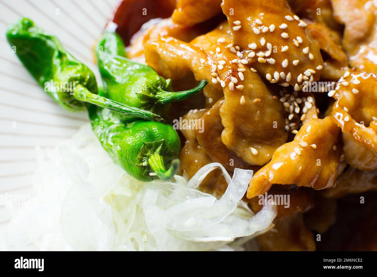 Chicken cooked in Japanese style with teriyaki sauce Stock Photo - Alamy