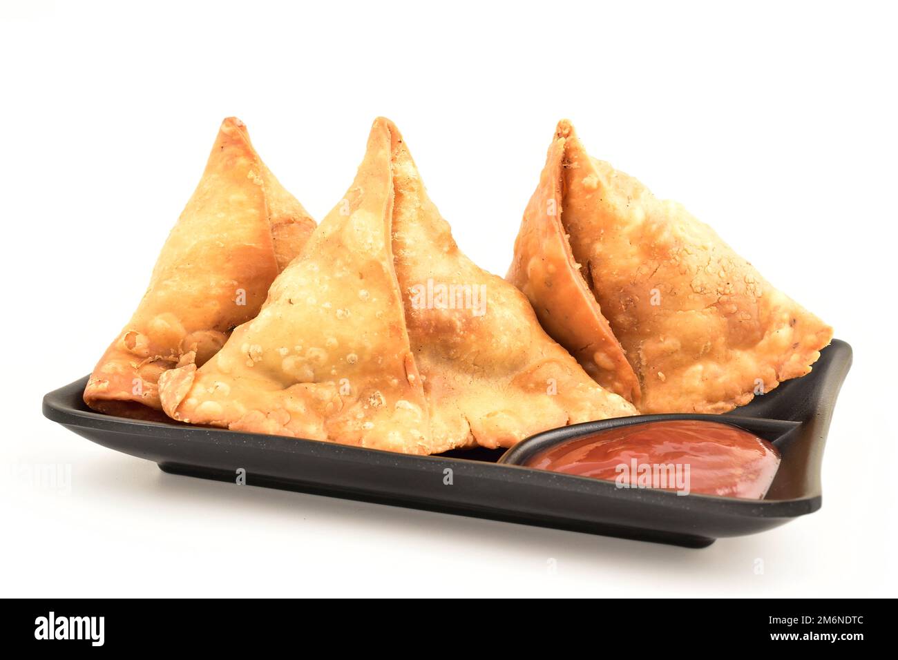 Bunch of samosa in plate isolated on white background, famous indian ...