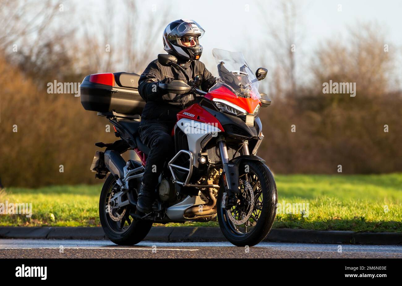 man riding a Ducati Multistrada V4 S motorcycle Stock Photo - Alamy