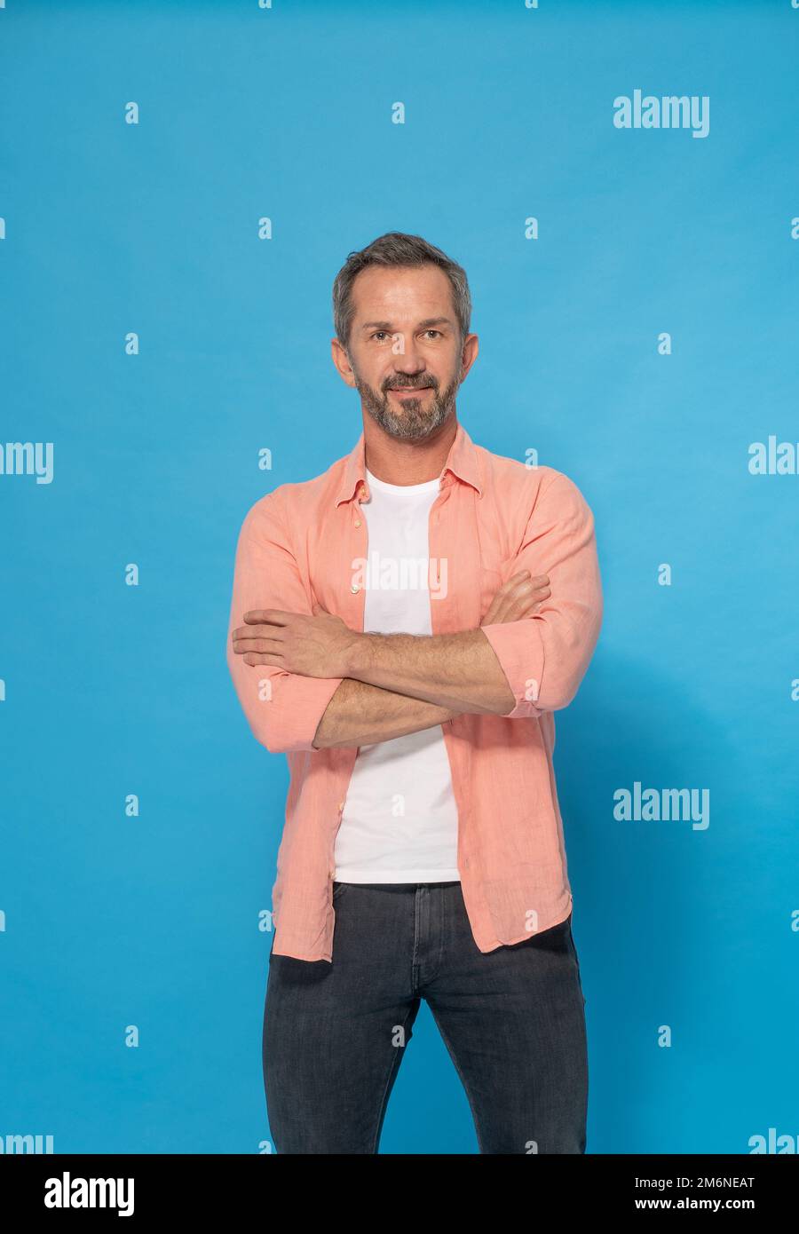 Strong handsome middle aged man with grey beard 40s, 50s wearing casual ...