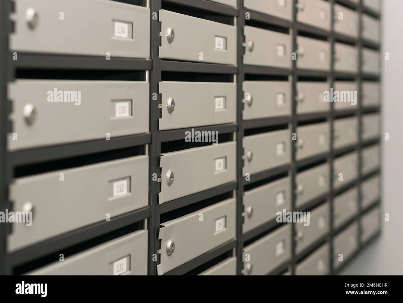 Mailboxes filled with numbers. In an apartment building 2 Stock Photo ...