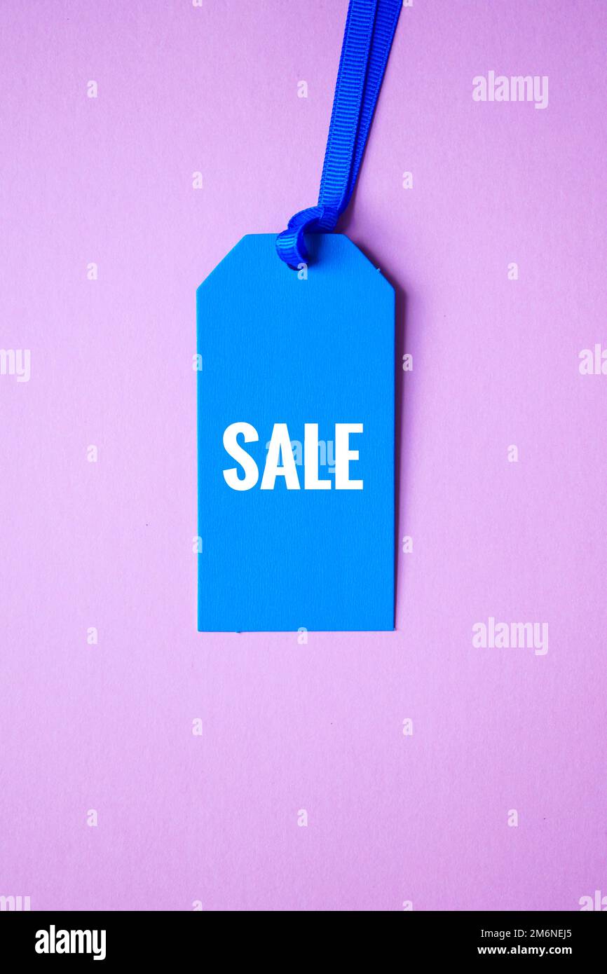 blue price tag with sale word on the pink background, blue mockup Stock ...