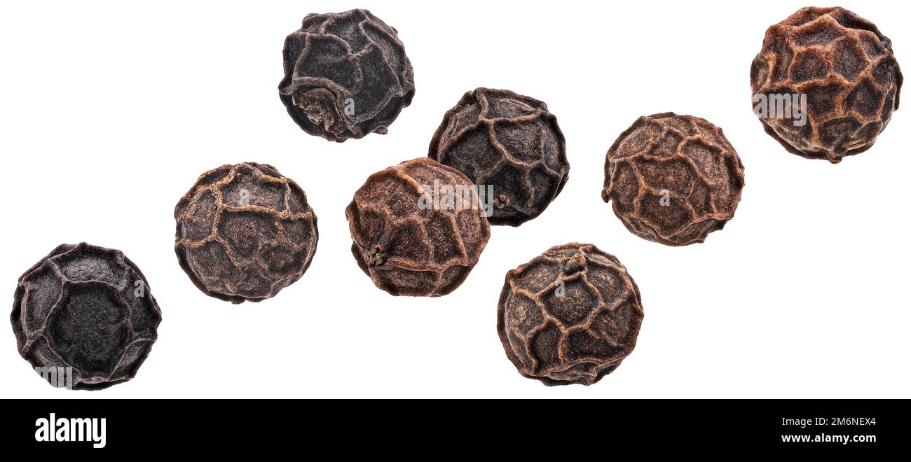 Falling black pepper isolated on white background Stock Photo - Alamy