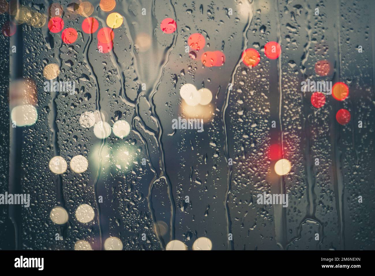 raindrops on the window and street lights background at night Stock ...