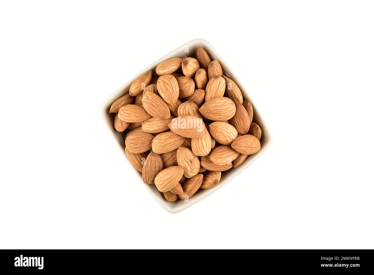 Almond in bowl isolated on white background with clipping path Stock ...