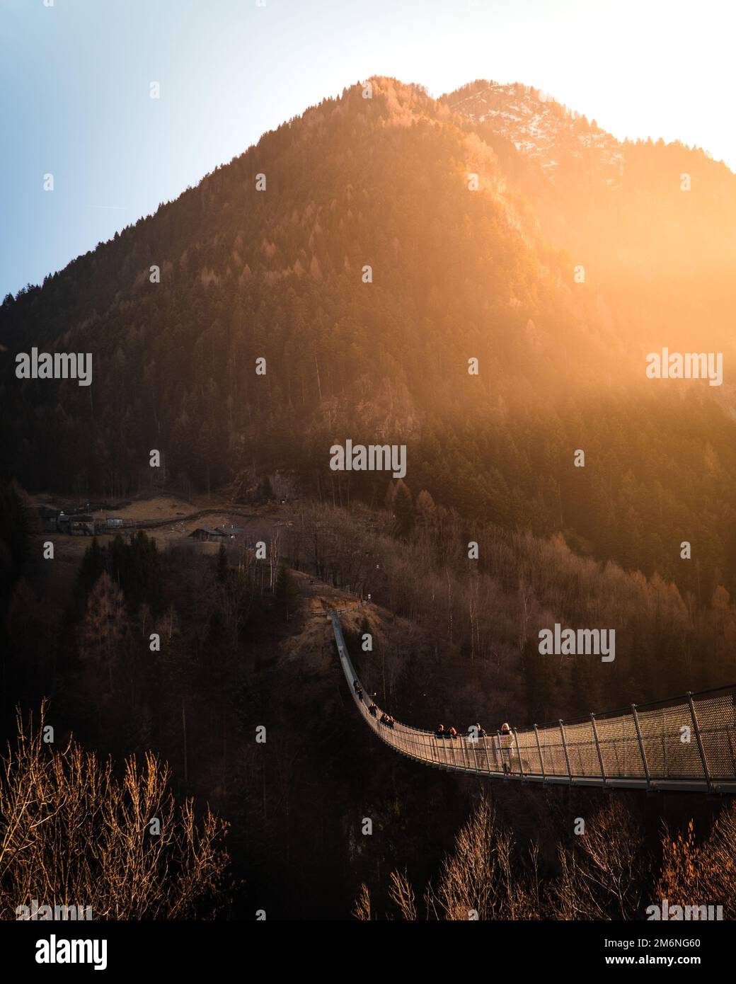 An image of a bridge in the mountains with a big mount behind Stock ...