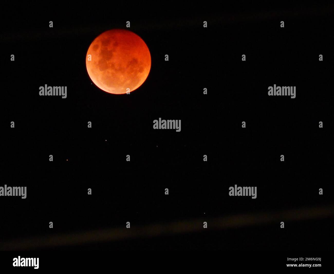 Lunar eclipse seen - blood moon seen on 8th Nov 2022 Stock Photo - Alamy