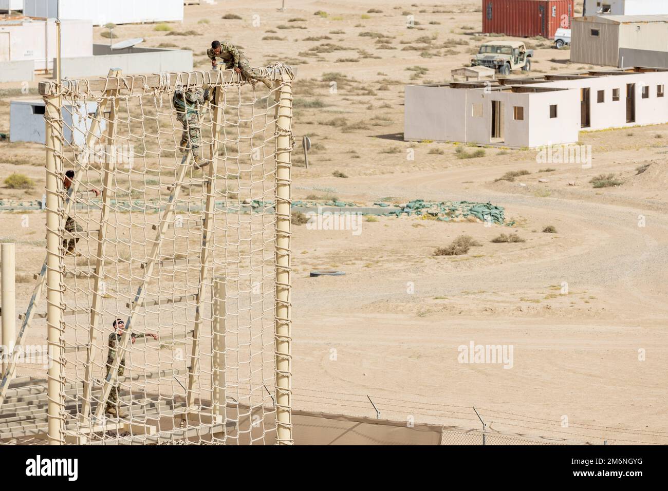 CAMP BUEHRING, Kuwait - U.S. Soldiers navigate the Air Assault Obstacle ...