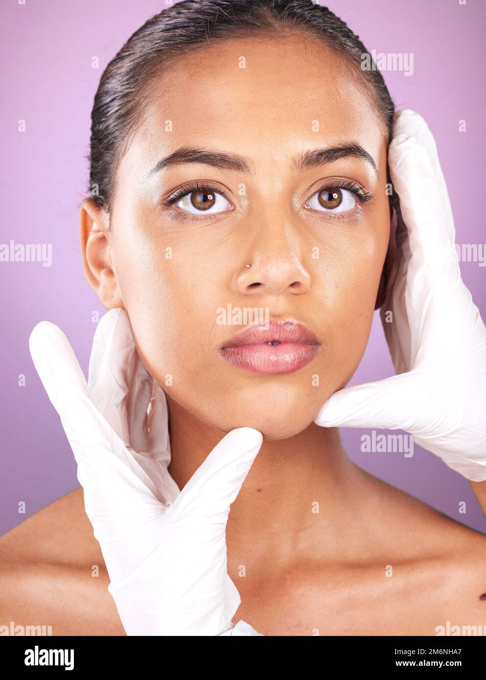 Plastic surgery, patient and hands of doctor check client face for ...