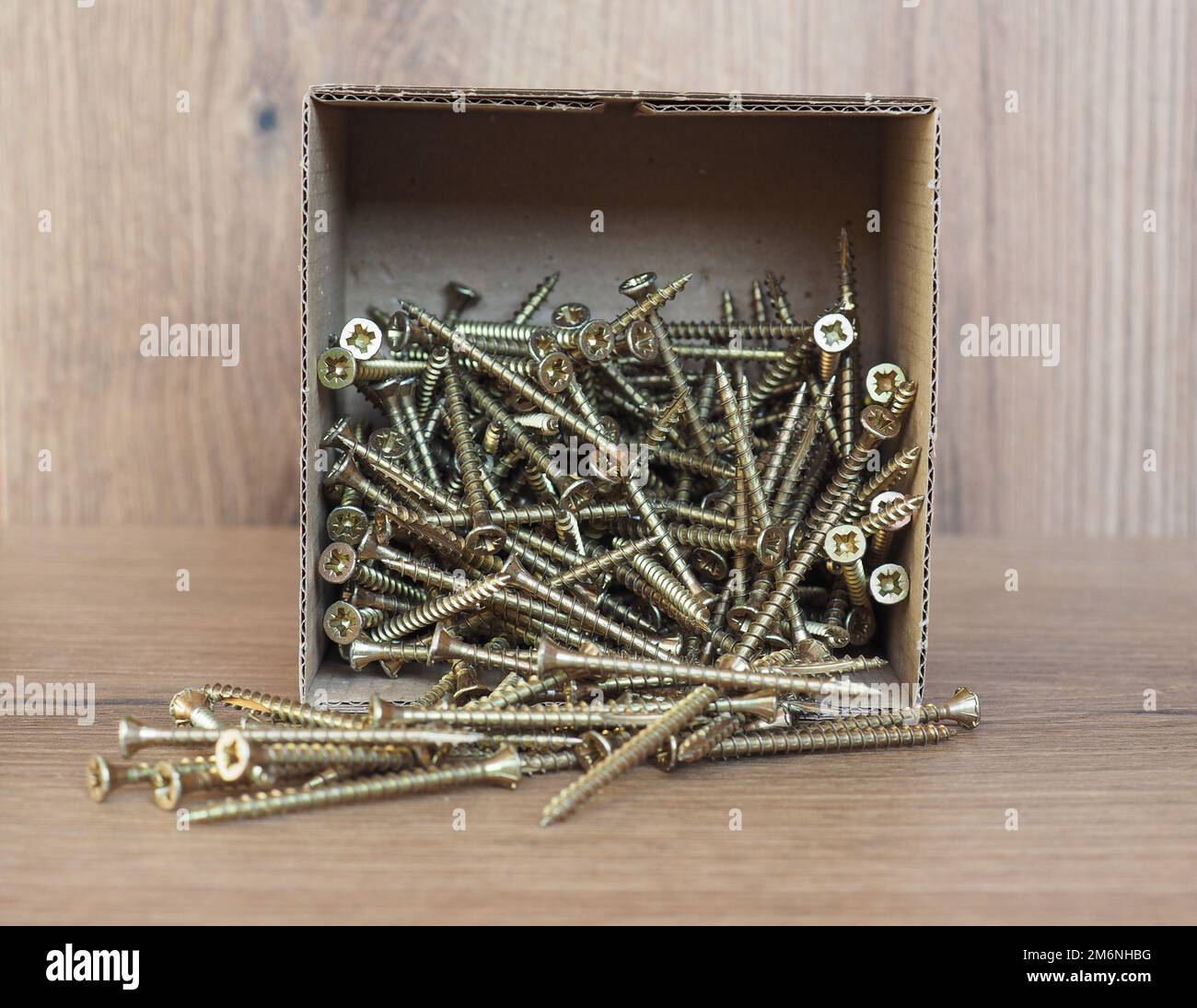 wood screws in a box on melamine manufactured wood panel Stock Photo ...