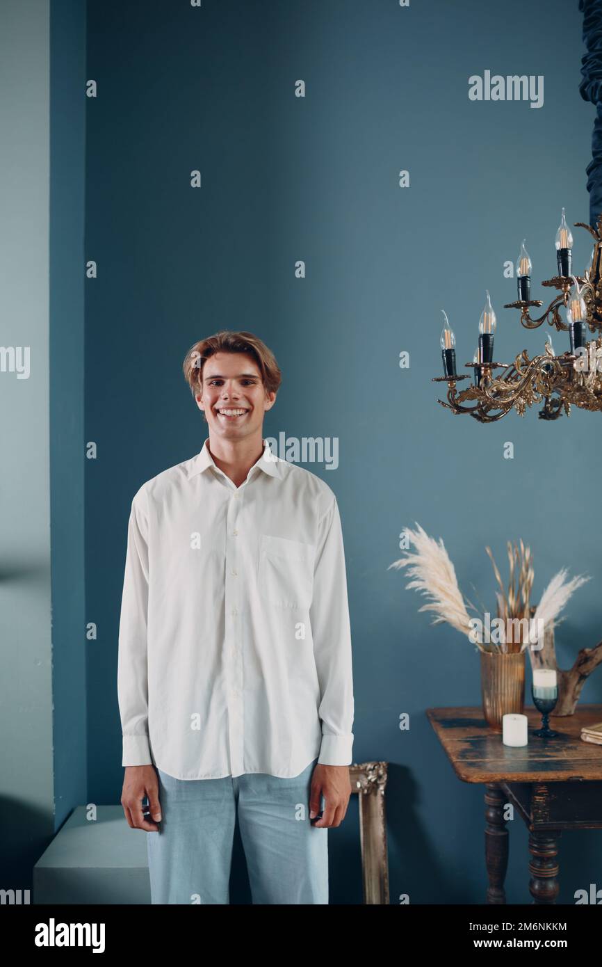 Portrait young man standing portrait at studio Stock Photo - Alamy