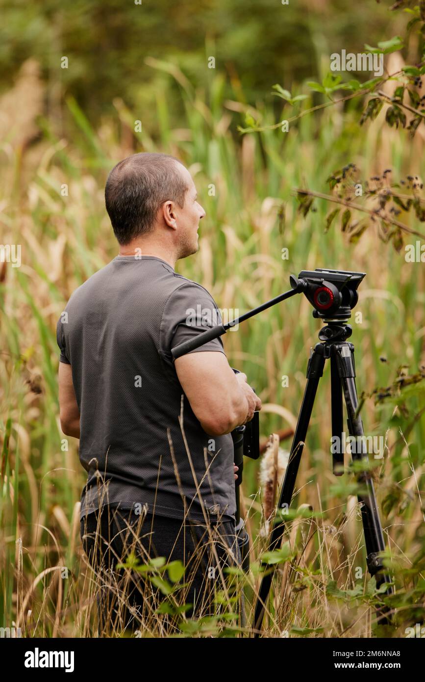 Seen from behind photographer hi-res stock photography and images - Alamy