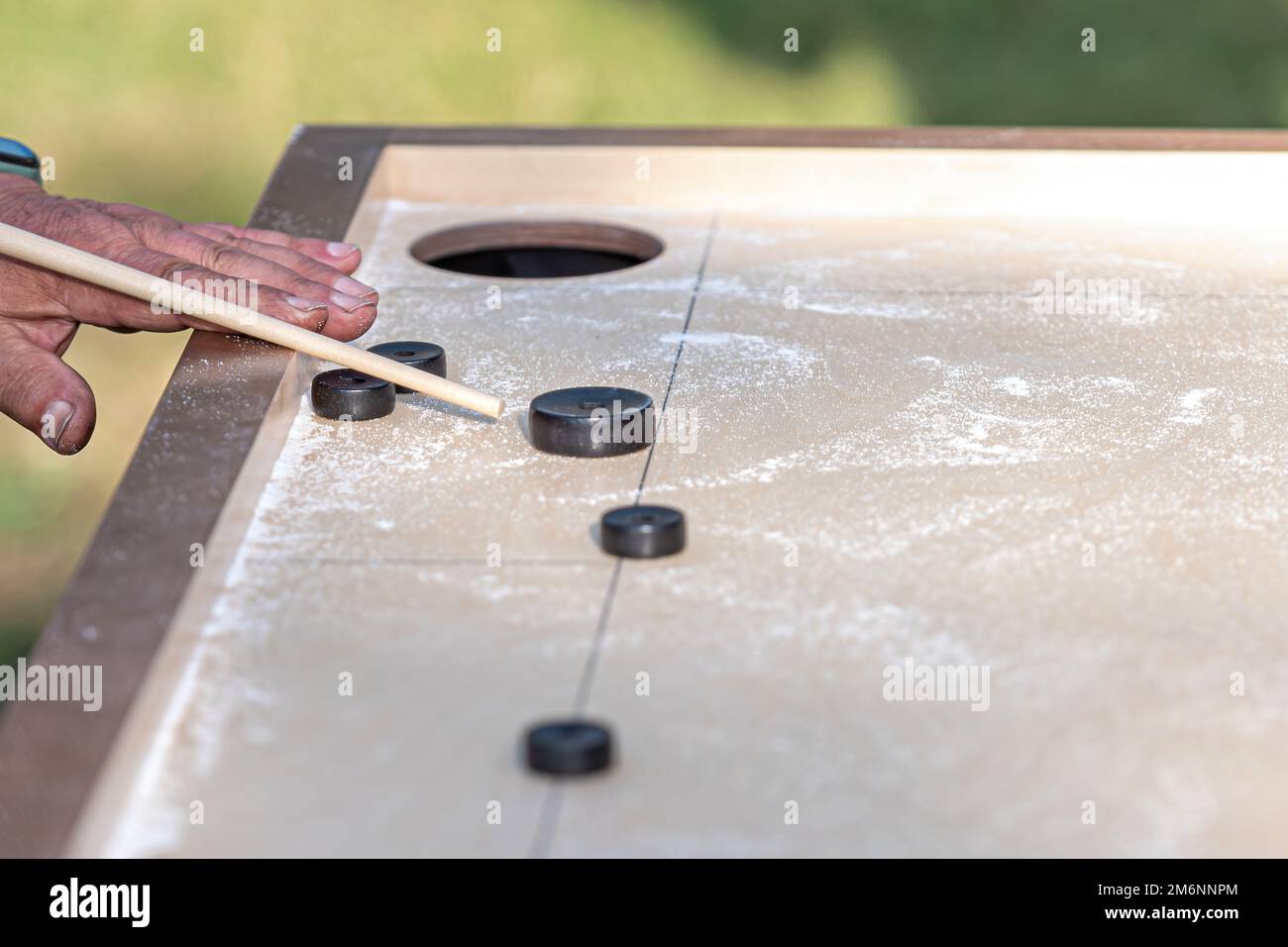 Men playing Novuss game. Novuss is a national sport in Latvia similar ...