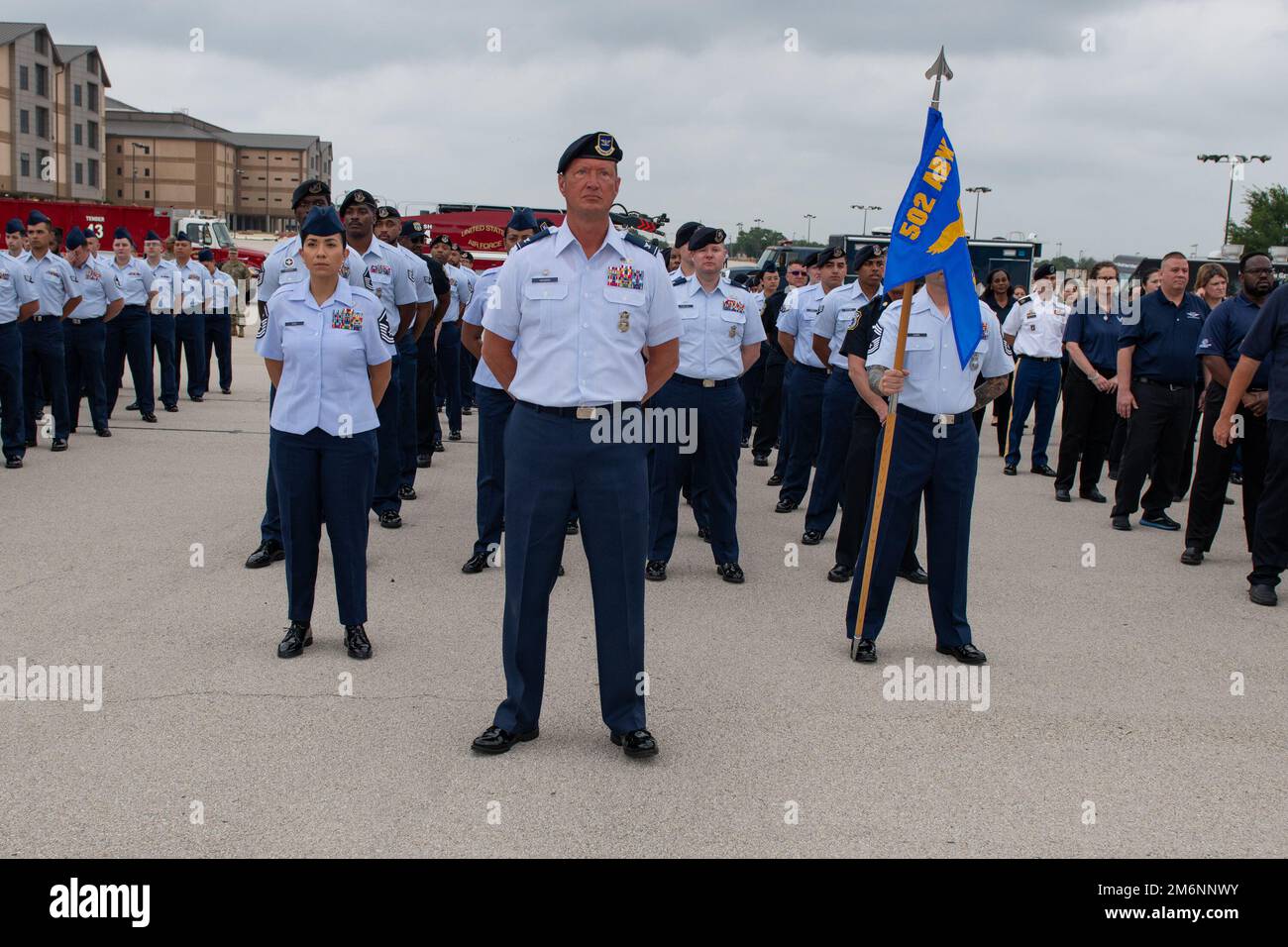 U.S. Air Force Col. James Masoner, Commander, 502nd Security Forces Group, stands in formation ...