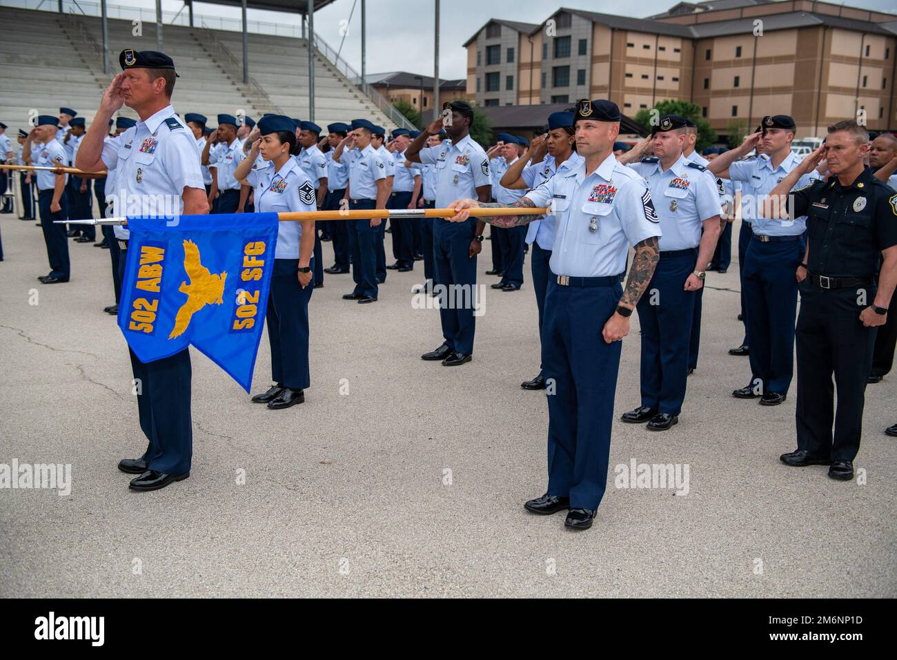 502nd Security Forces Group renders a salute during the 502nd Air Base Wing Change of command ...