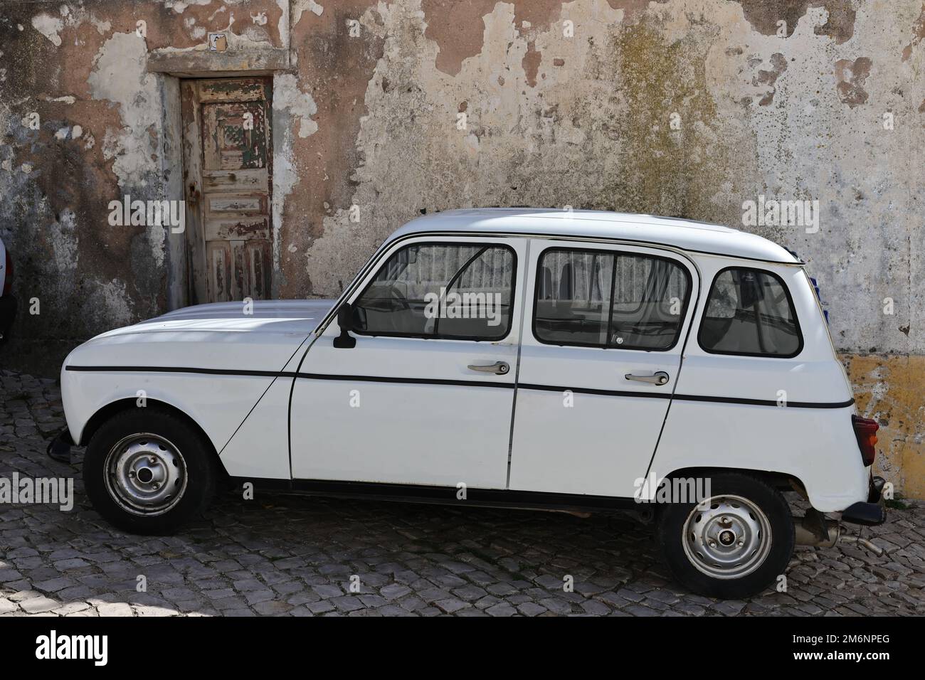 A vintage old white Renault 4L on the side of a road Stock Photo - Alamy