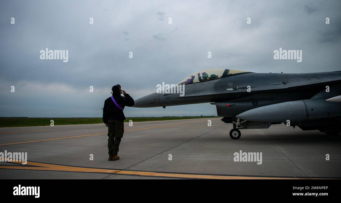 A U.S. Air Force crew chief assigned to the 510th Expeditionary Fighter ...