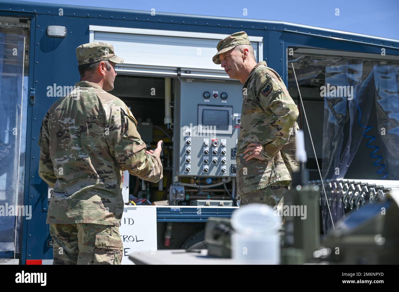 Gen. Daniel Hokanson, Chief, National Guard Bureau, speaks with Sgt ...